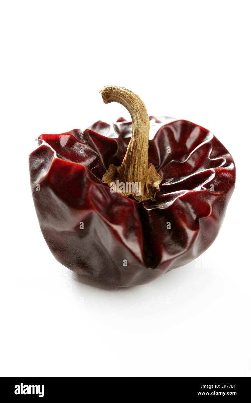 Dried red chilli dark background Cut Out Stock Images & Pictures - Alamy