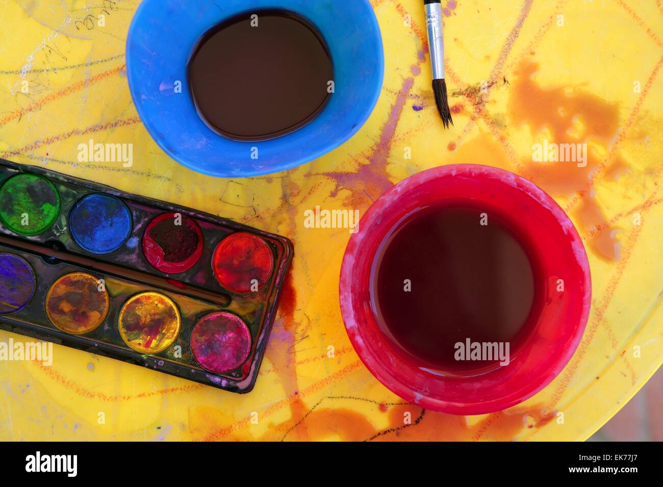 Children messy dirty student watercolor table Stock Photo - Alamy
