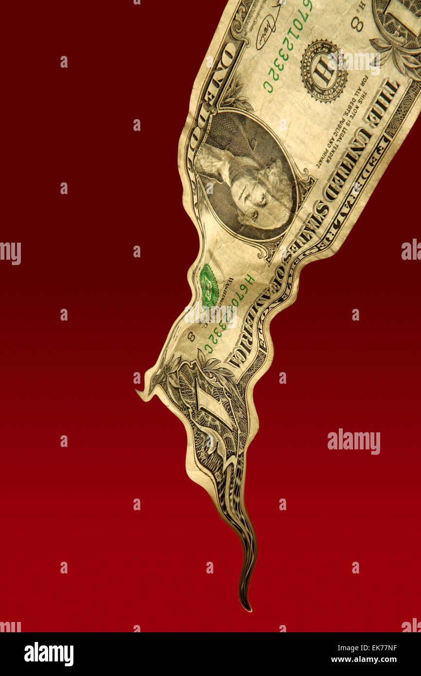 One liquid dollar note falling on red background Stock Photo - Alamy