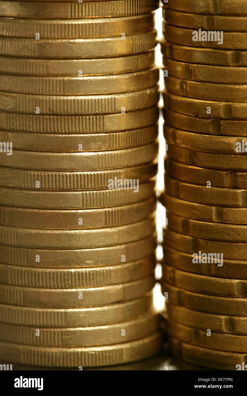 Euro coin columns, golden cash over white background Stock Photo - Alamy