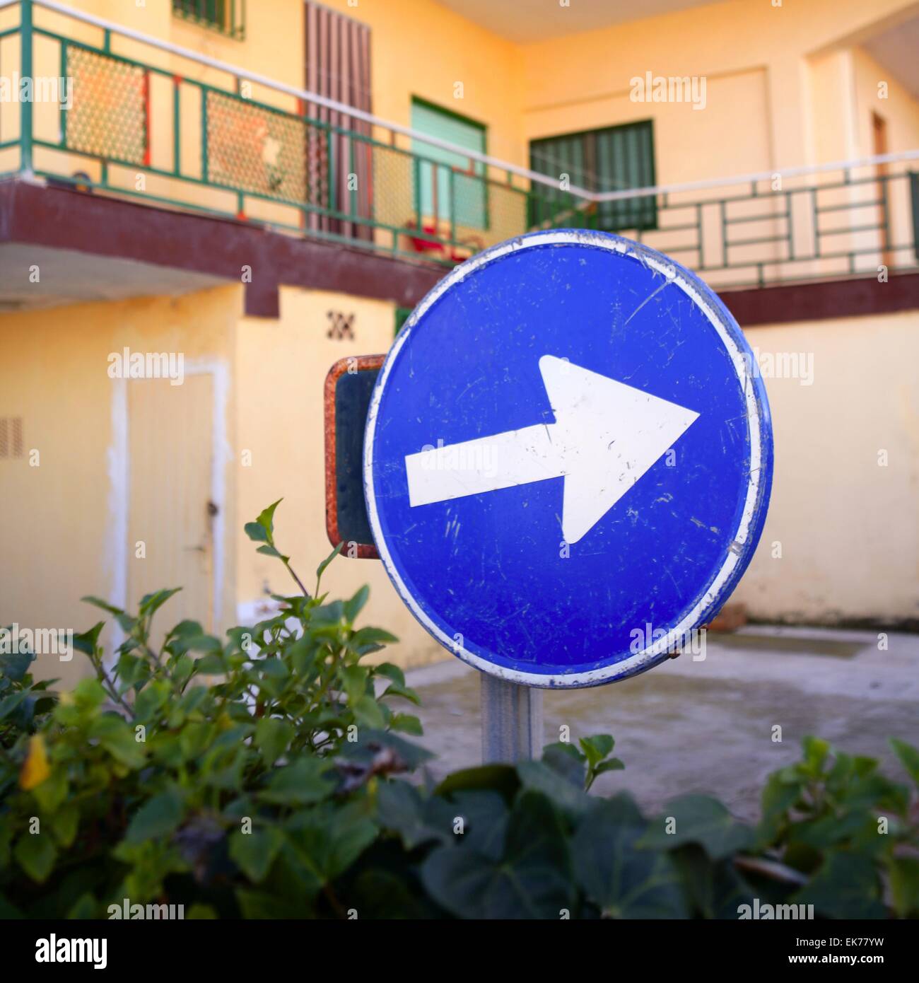 Blue traffic signal, only right. House background Stock Photo - Alamy