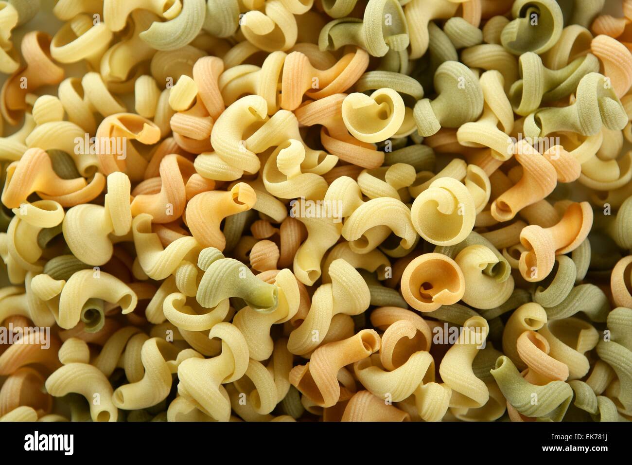 Snail shape Italian pasta texture Stock Photo - Alamy