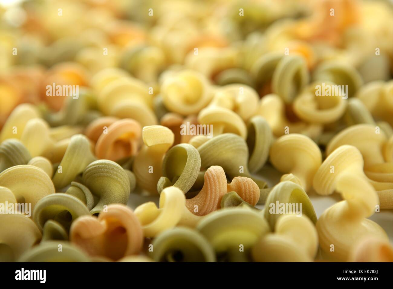 Snail shape Italian pasta texture Stock Photo - Alamy