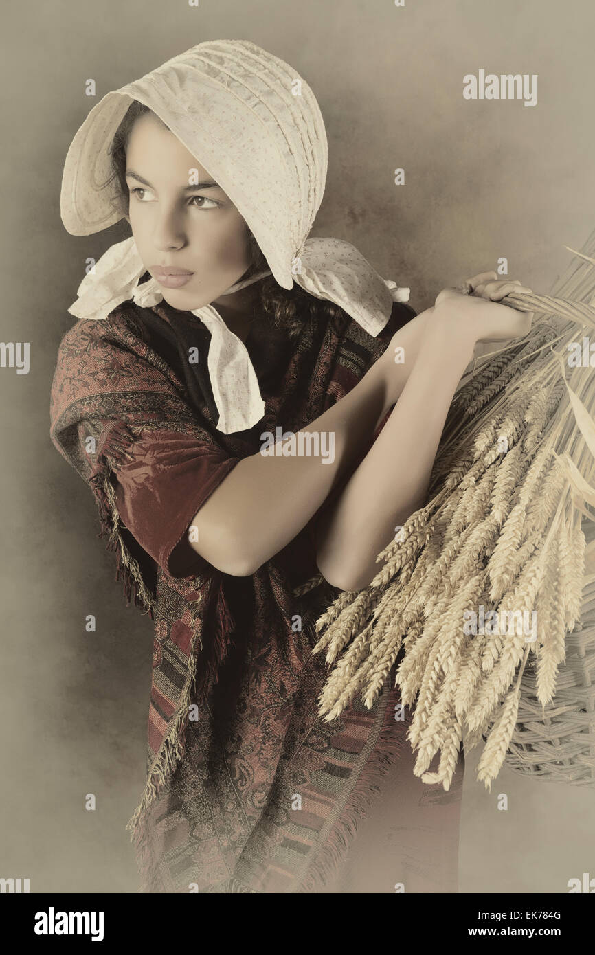Reenactment image of a victorian peasant girl holding a basket Stock ...