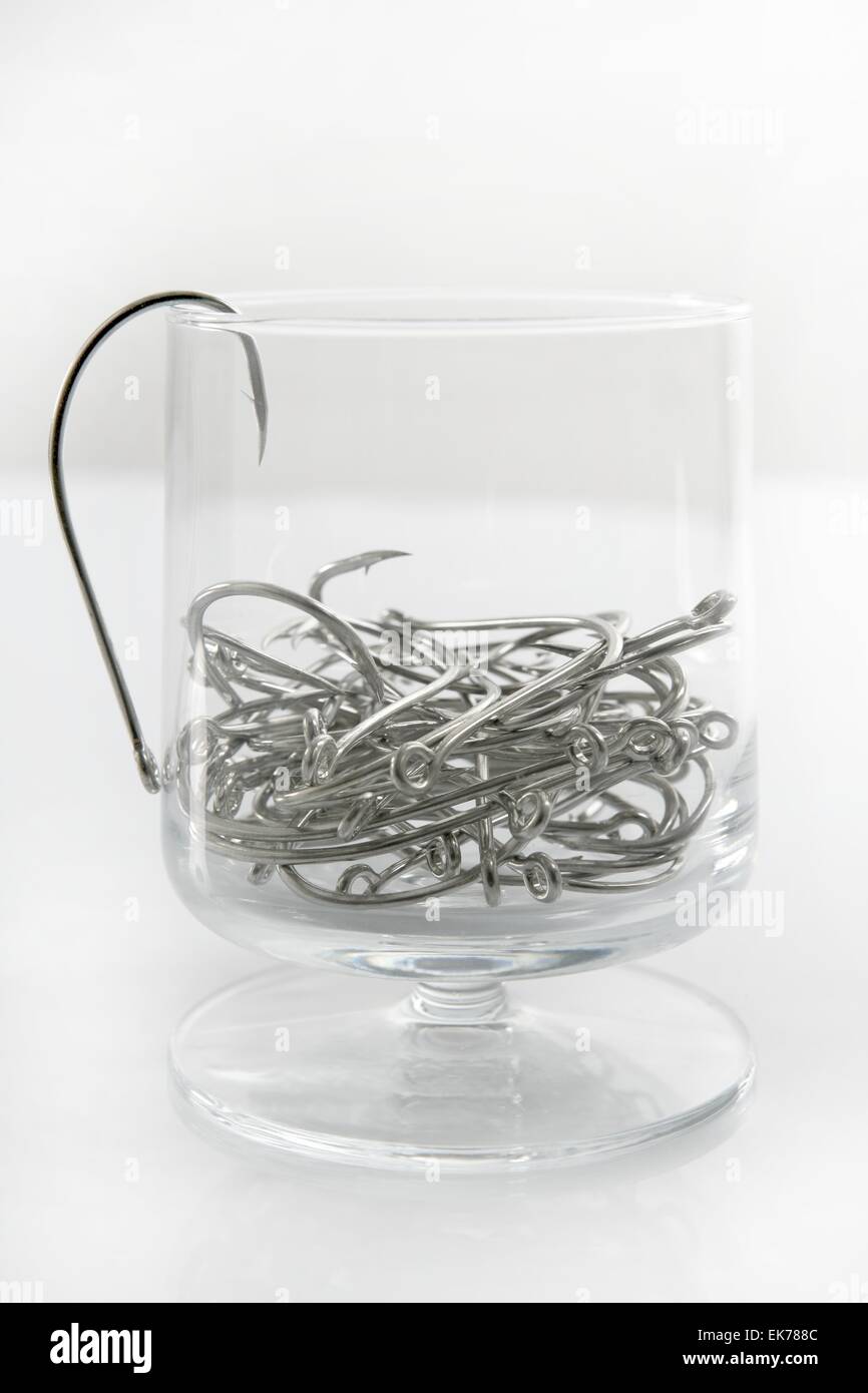 fishing hooks over white background Stock Photo - Alamy