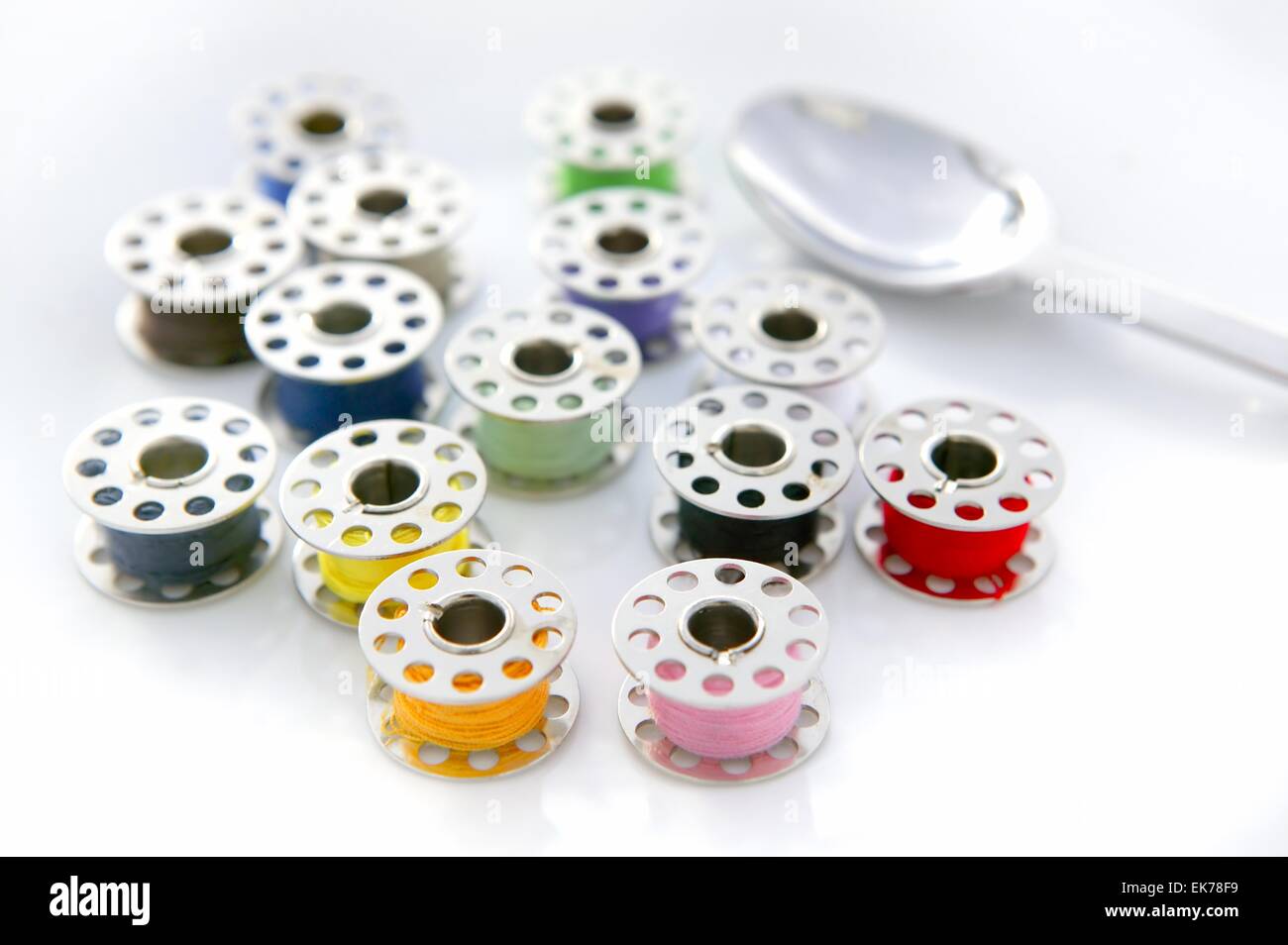 surreal meal of color sewing reels Stock Photo - Alamy