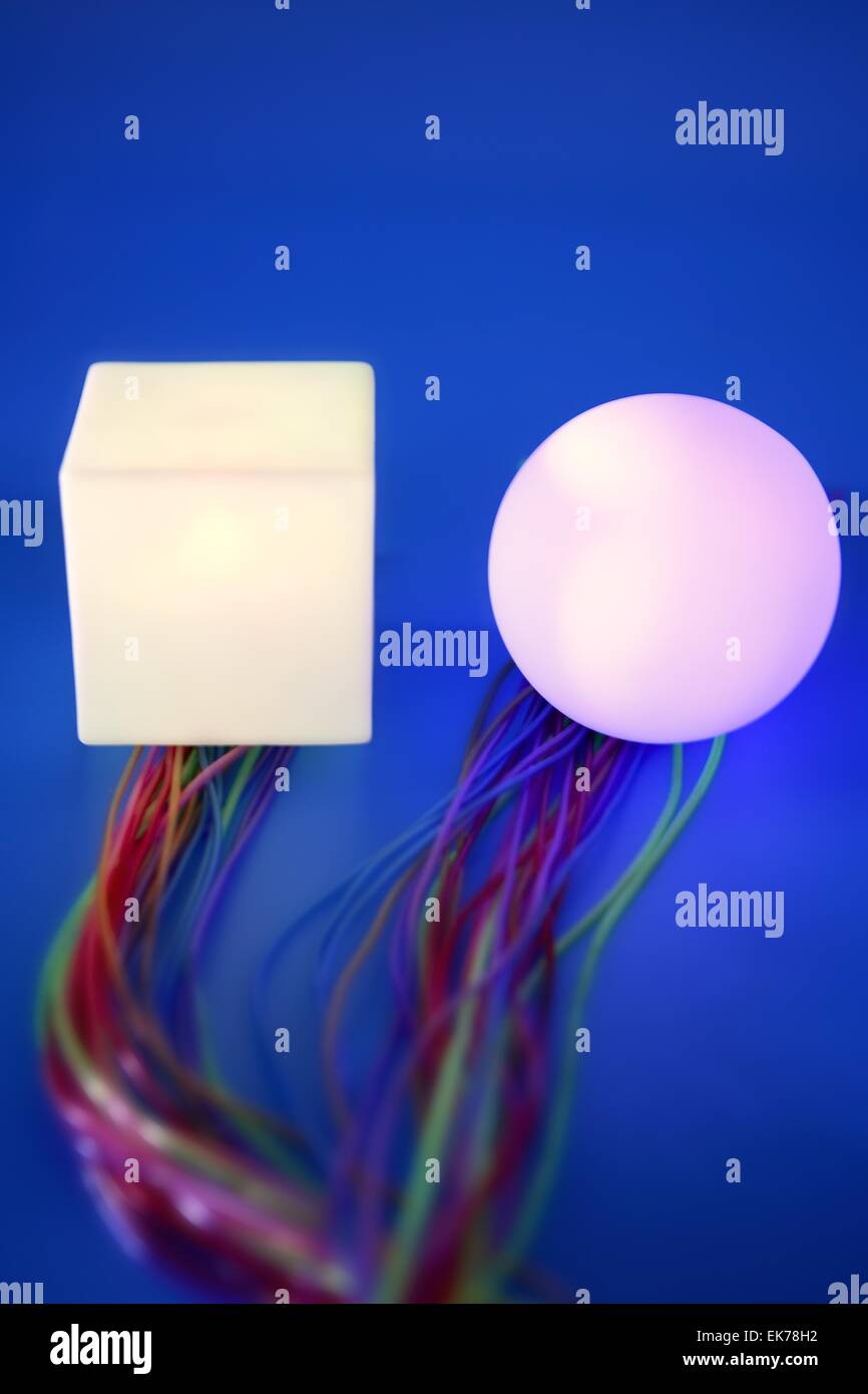 Glowing square and sphere with colorful wires Stock Photo - Alamy
