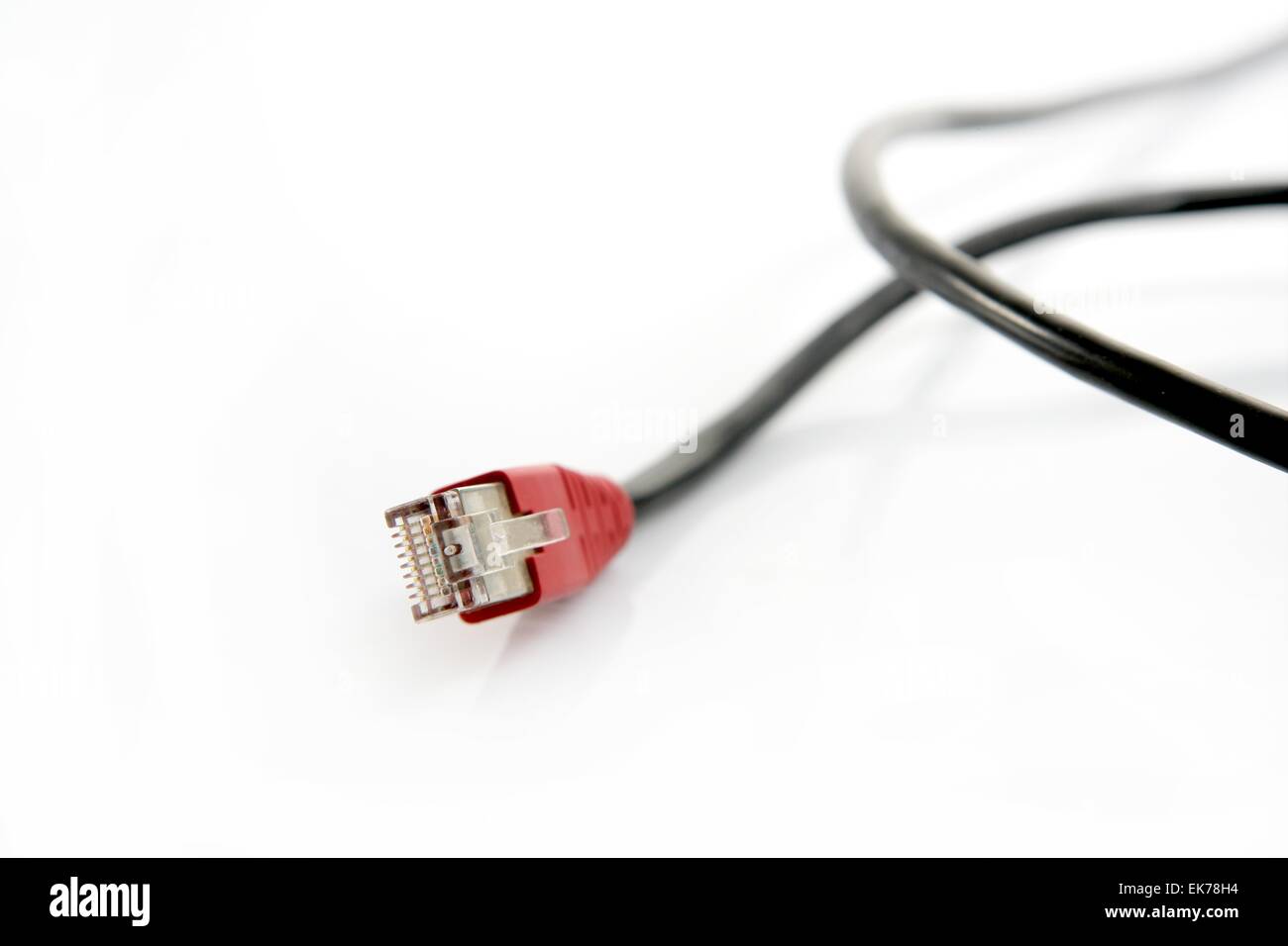 Ethernet rj45 cable isolated over white Stock Photo - Alamy