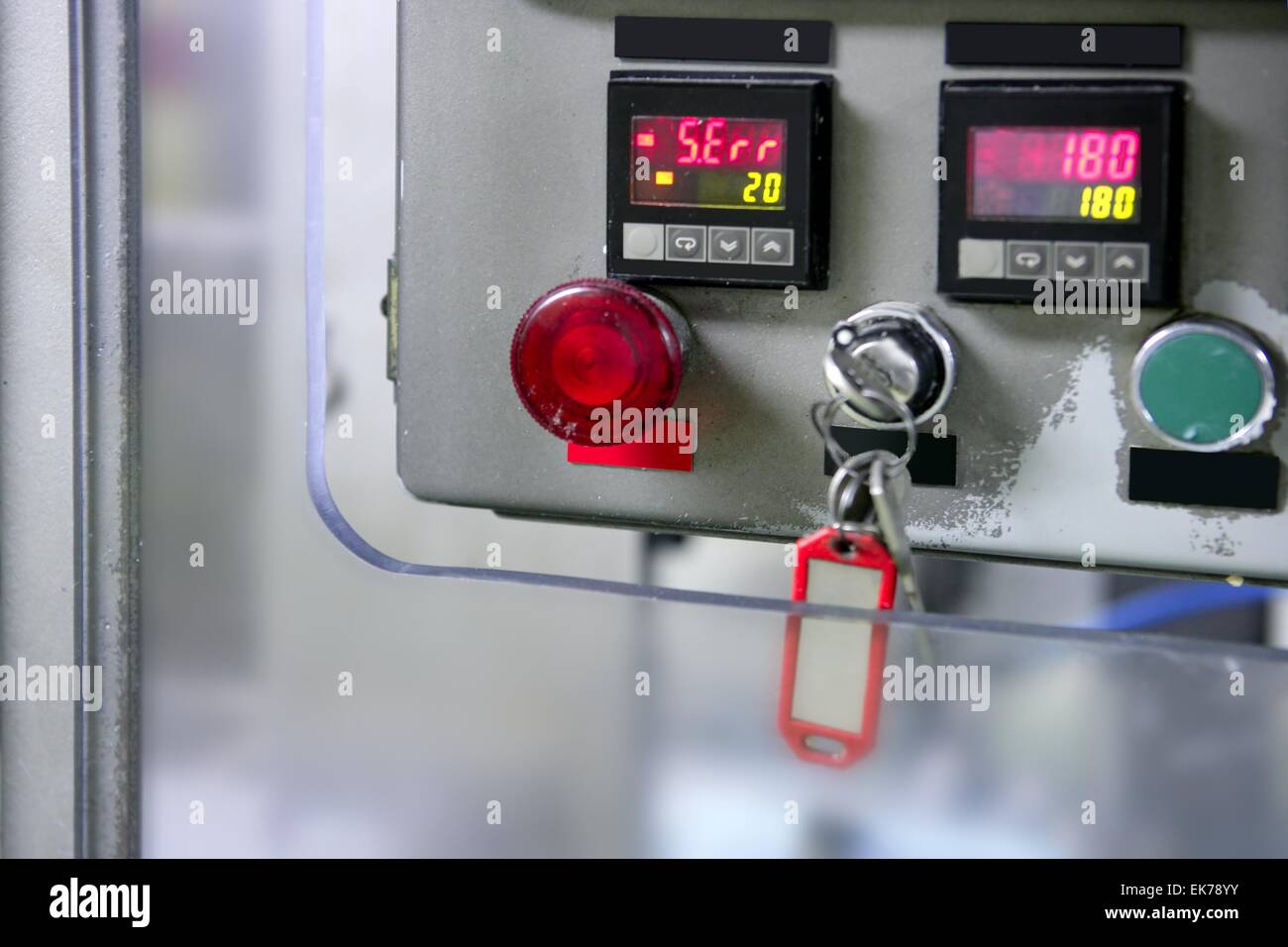 Industrial control panel installation button Stock Photo - Alamy