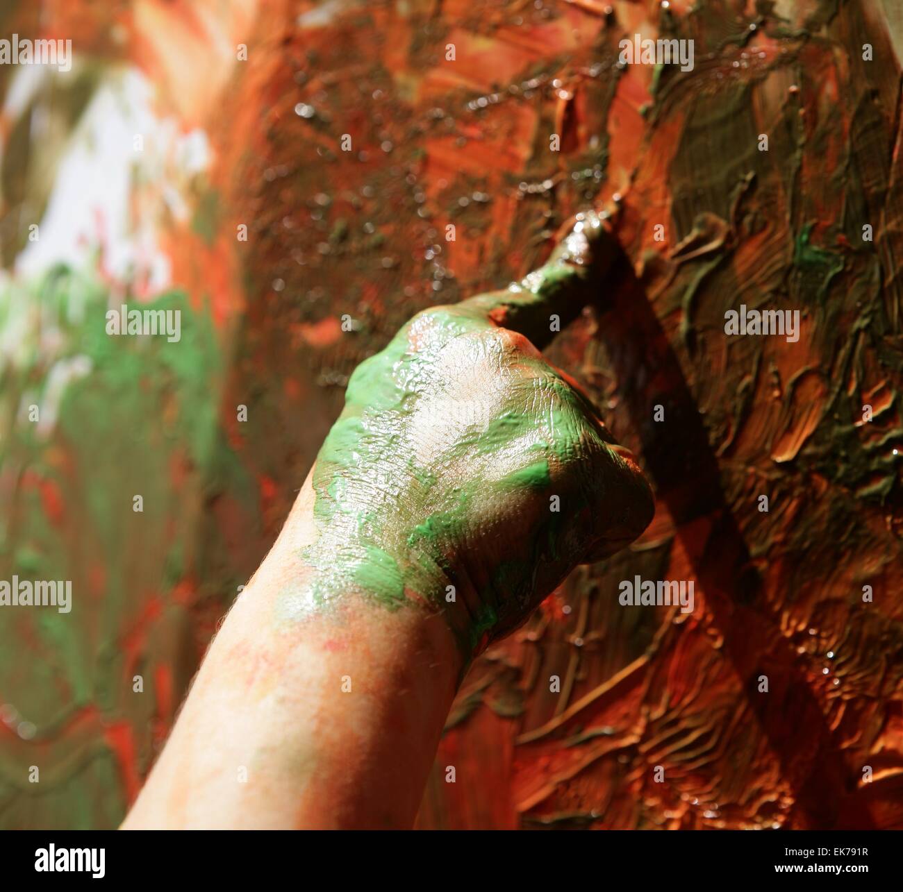 Children artist hands painting multi colors Stock Photo - Alamy