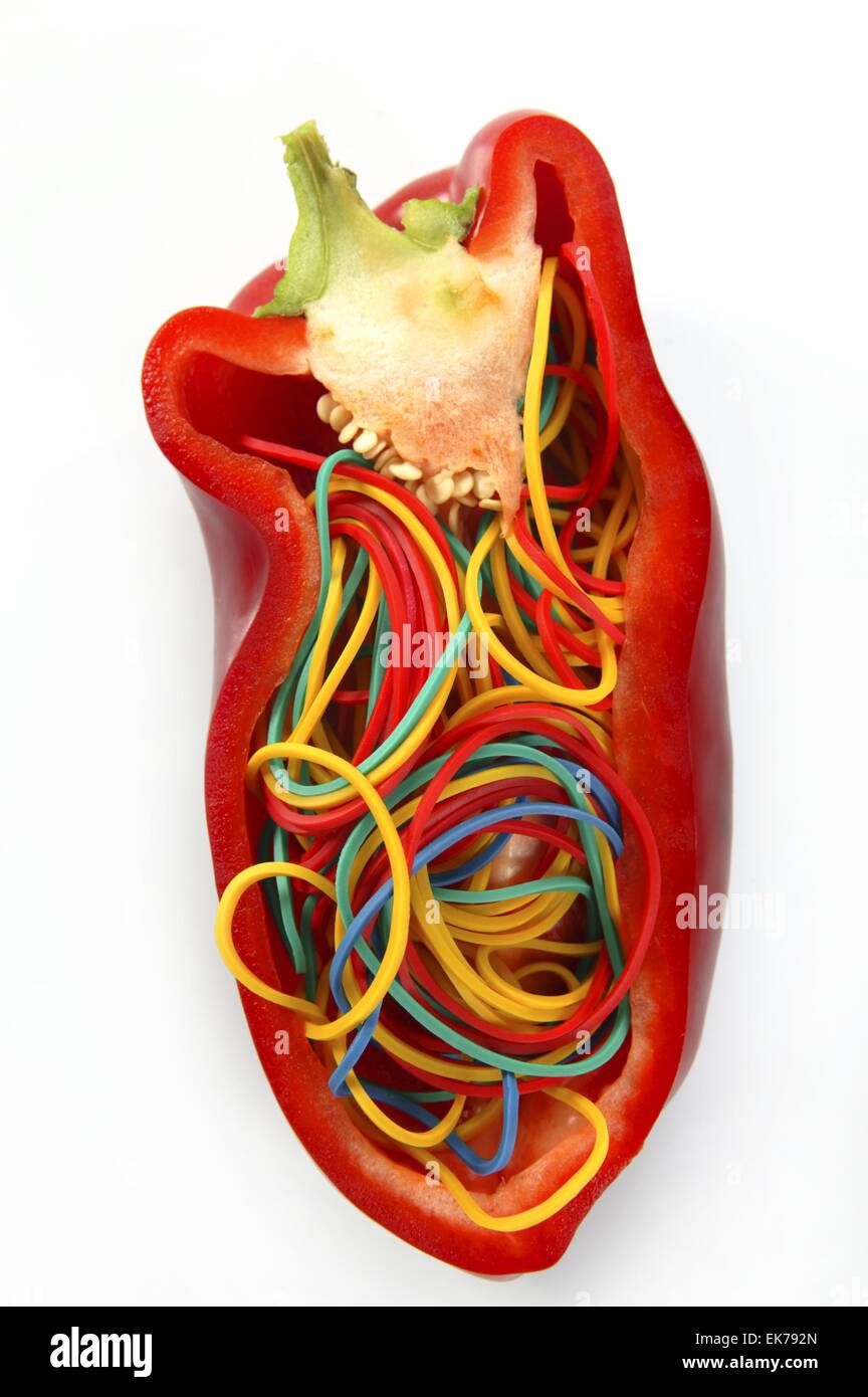 Half red pepper isolated over white Stock Photo - Alamy