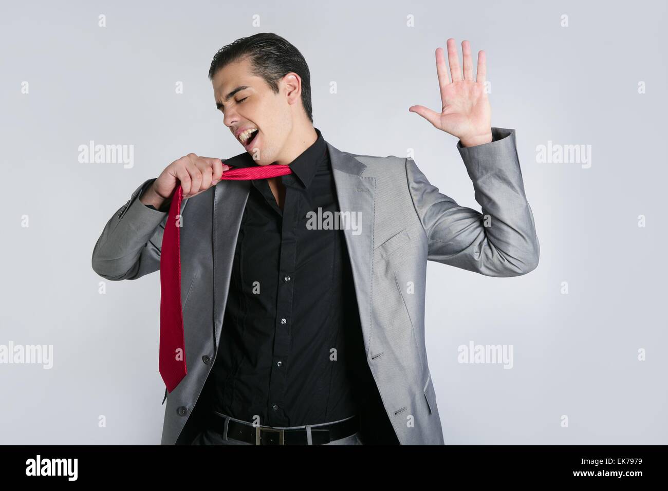Businessman break finish work take off tie Stock Photo - Alamy