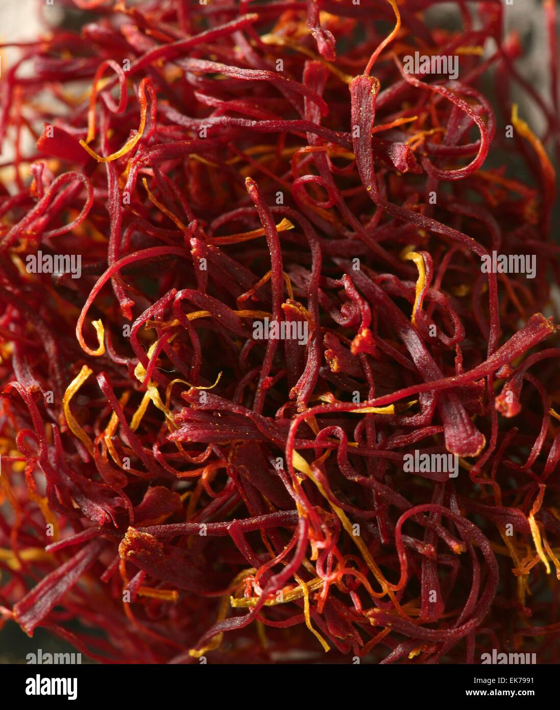 Saffron, appreciated red spice in vivid red orange Stock Photo - Alamy