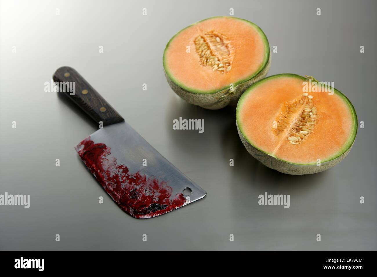 Melon fruit killed by a knife Stock Photo - Alamy