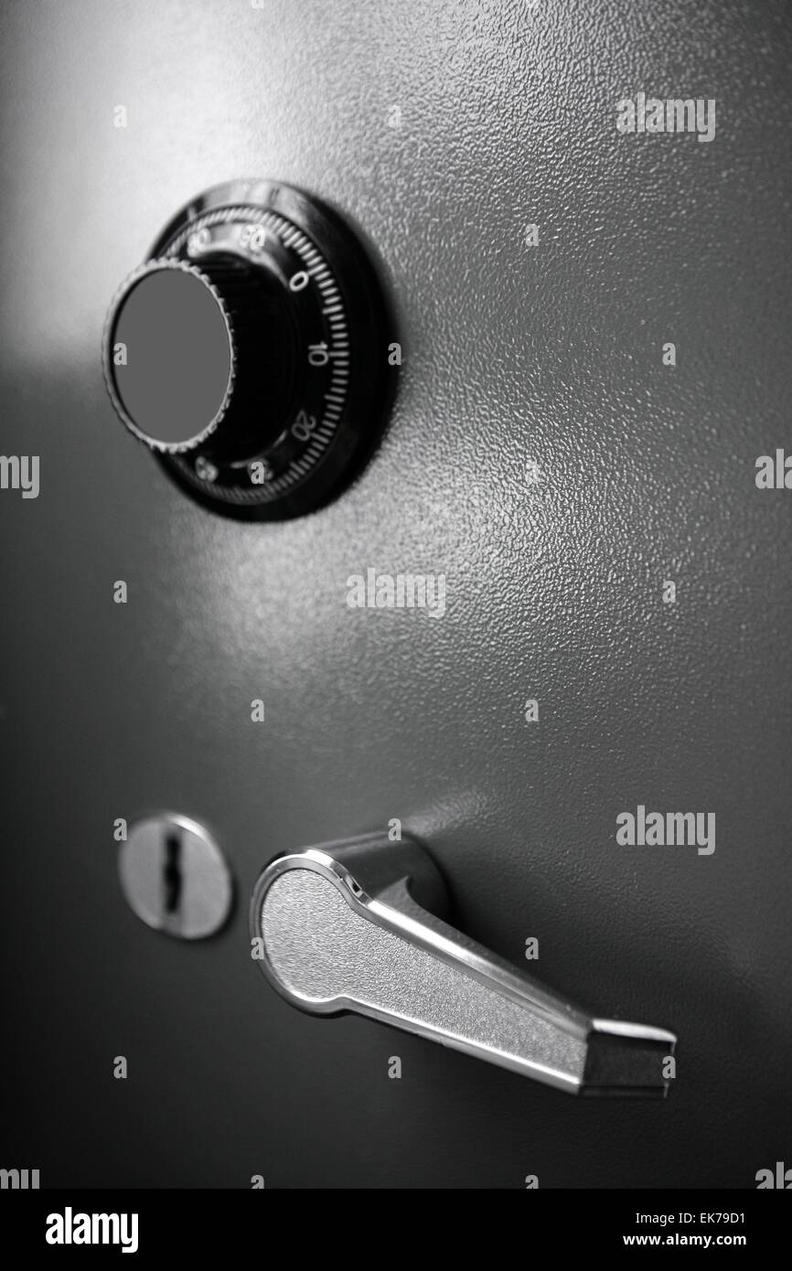 Safe gray steel box detail such a currency safety Stock Photo - Alamy