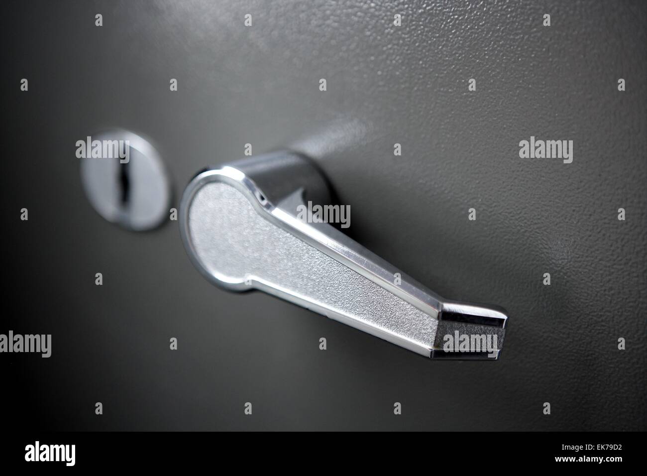 Safe gray steel box detail such a currency safety Stock Photo - Alamy