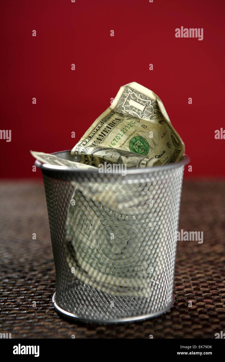 Dollar bank notes on the trash Stock Photo - Alamy
