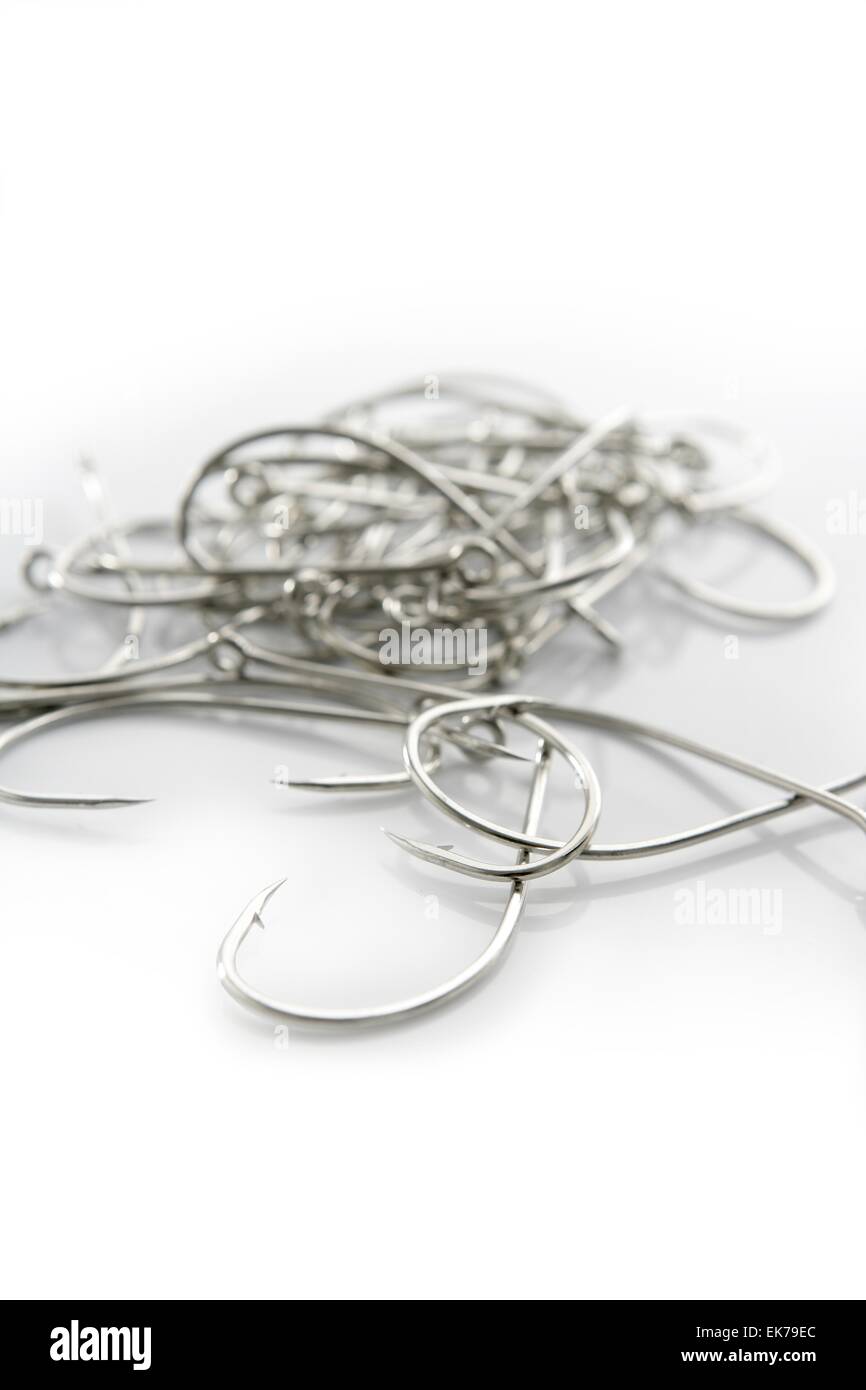 fishing hooks over white background Stock Photo - Alamy