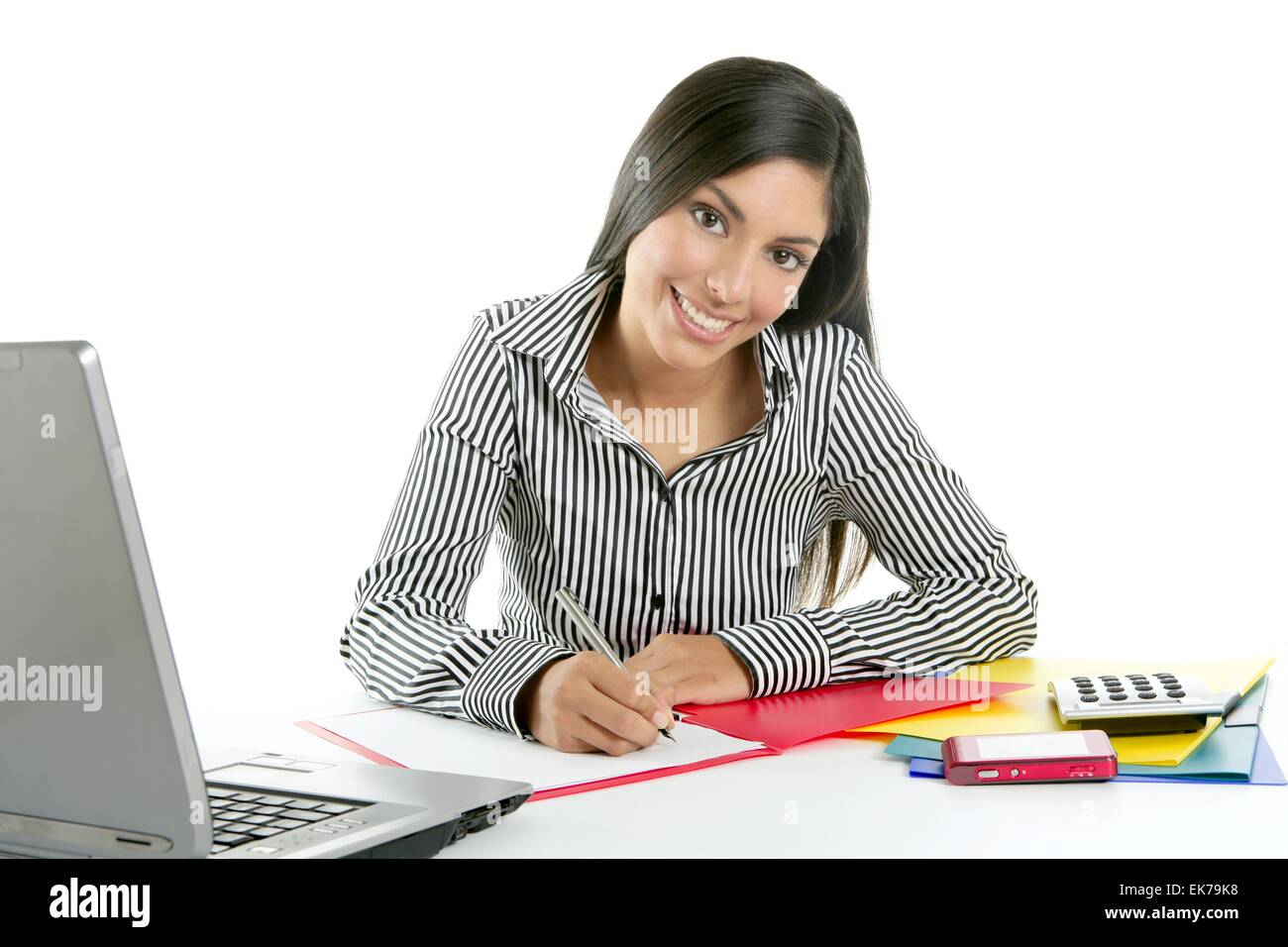 Beautiful secretary businesswoman writing on desk Stock Photo - Alamy