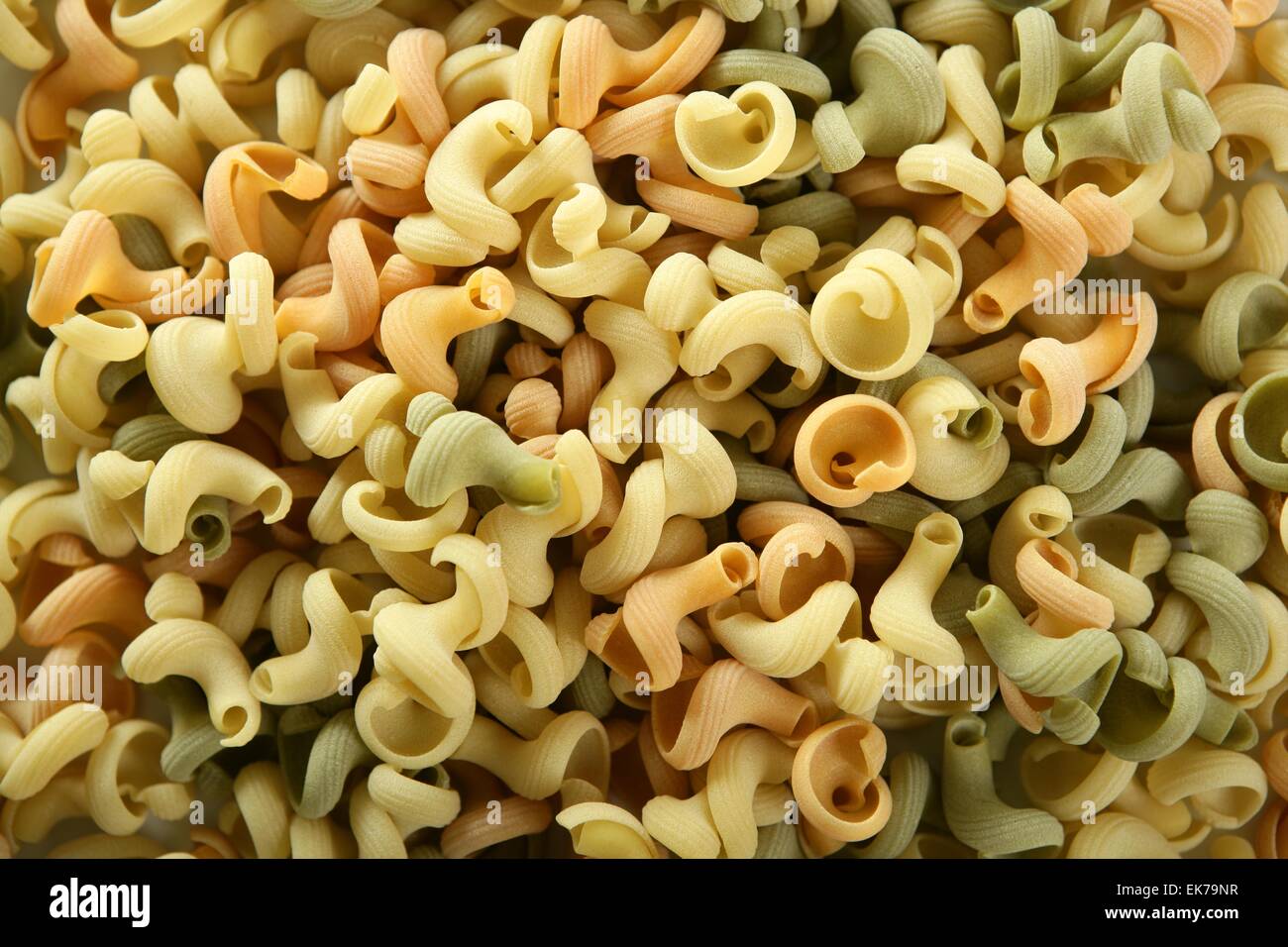 Snail shape Italian pasta texture Stock Photo - Alamy