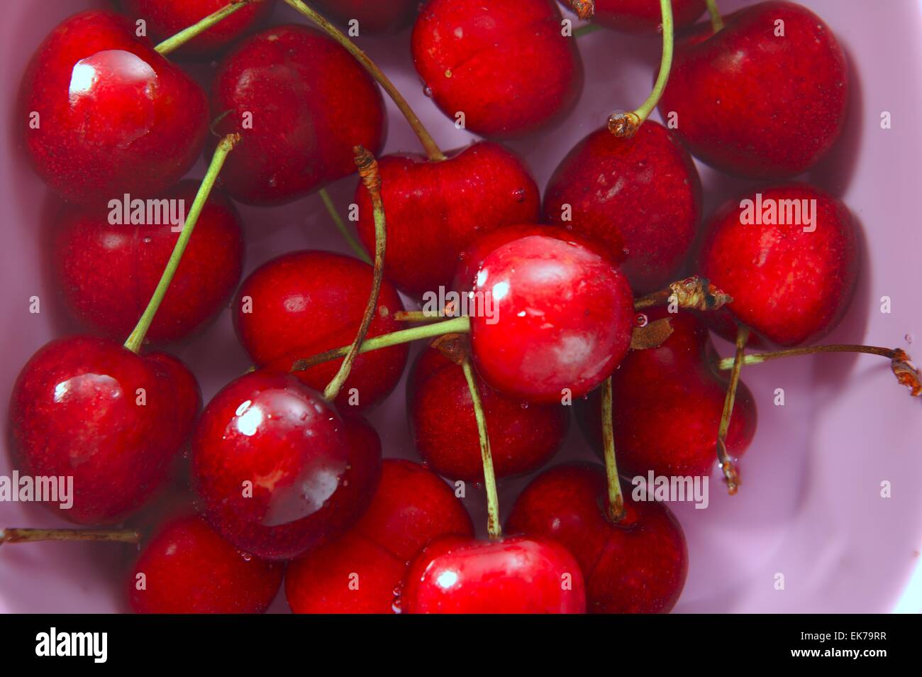 Cherry red fruits texture Stock Photo - Alamy