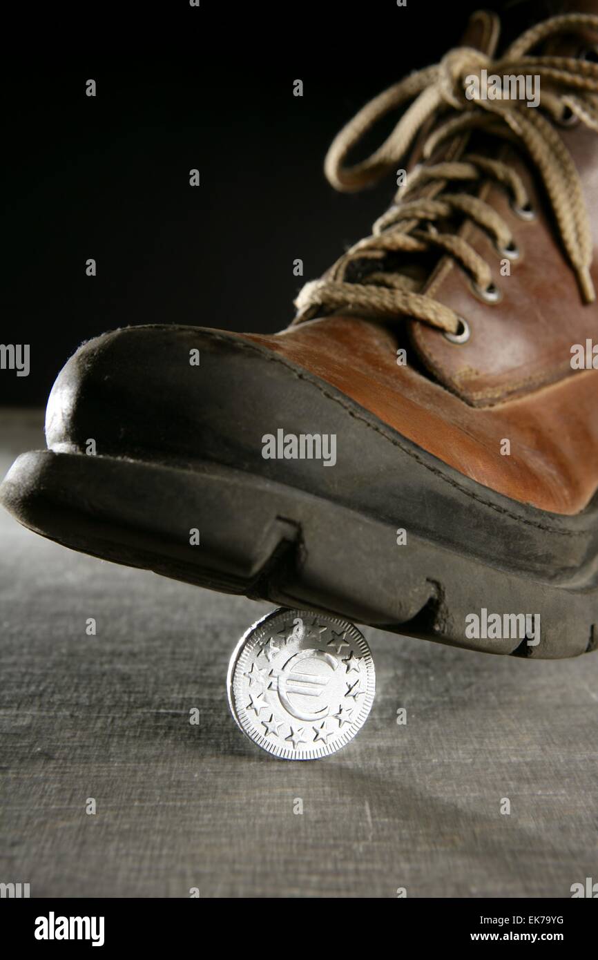euro currency coin tread by a boot Stock Photo - Alamy