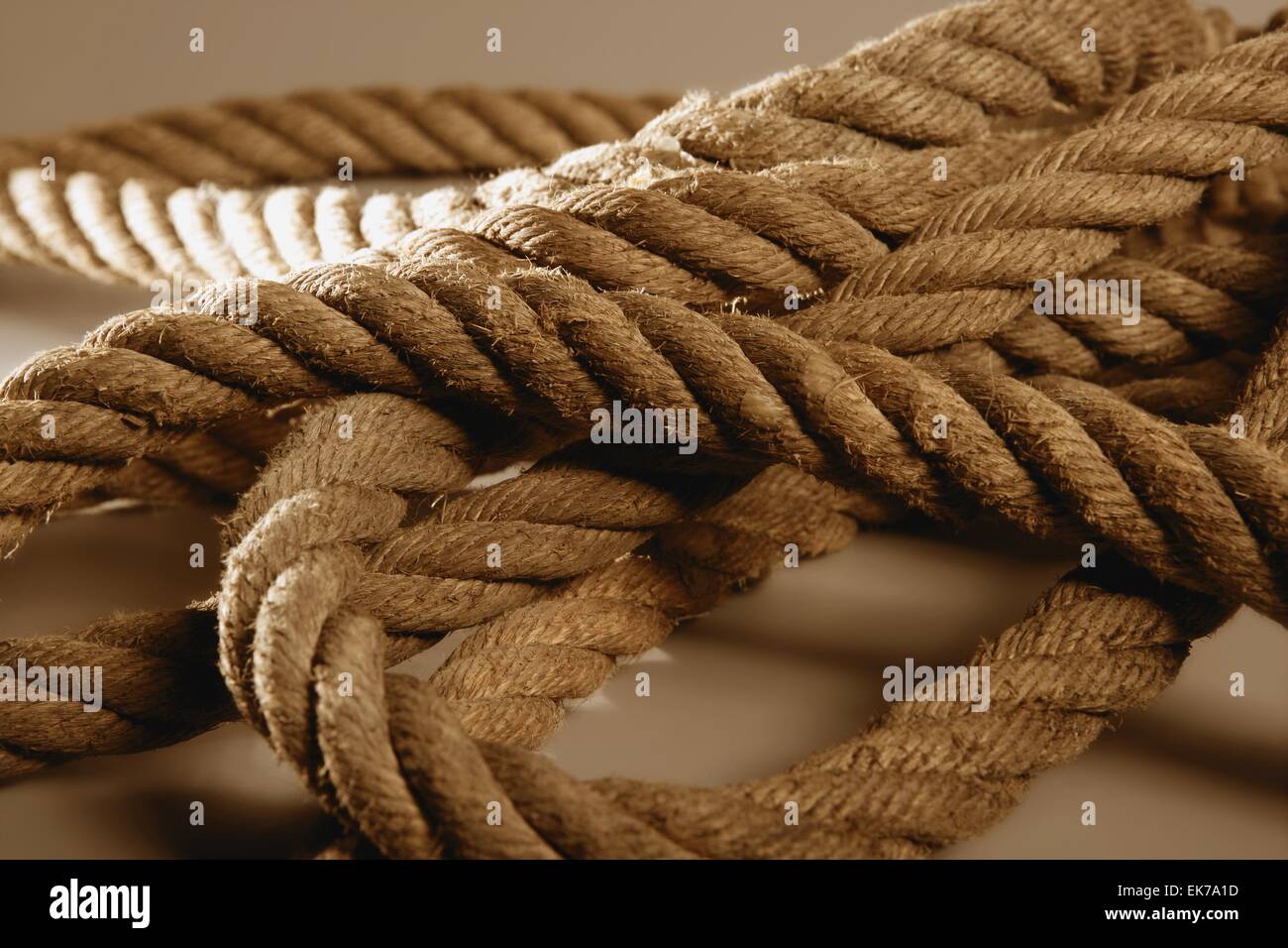 Old brown golden rough rope macro detail Stock Photo - Alamy