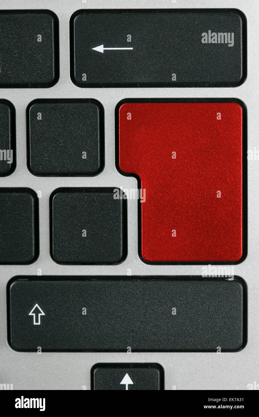 Keyboard with enter key in red color Stock Photo - Alamy