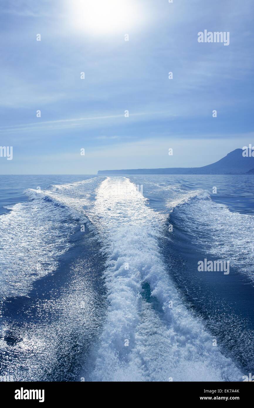 Boat white wake on the blue ocean sea Stock Photo - Alamy
