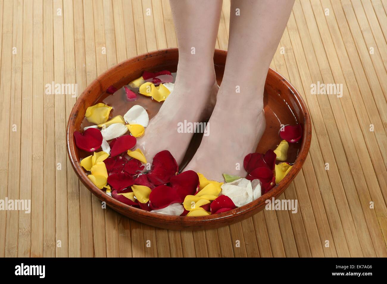 Aromatherapy, flowers feet bath, rose petal Stock Photo - Alamy