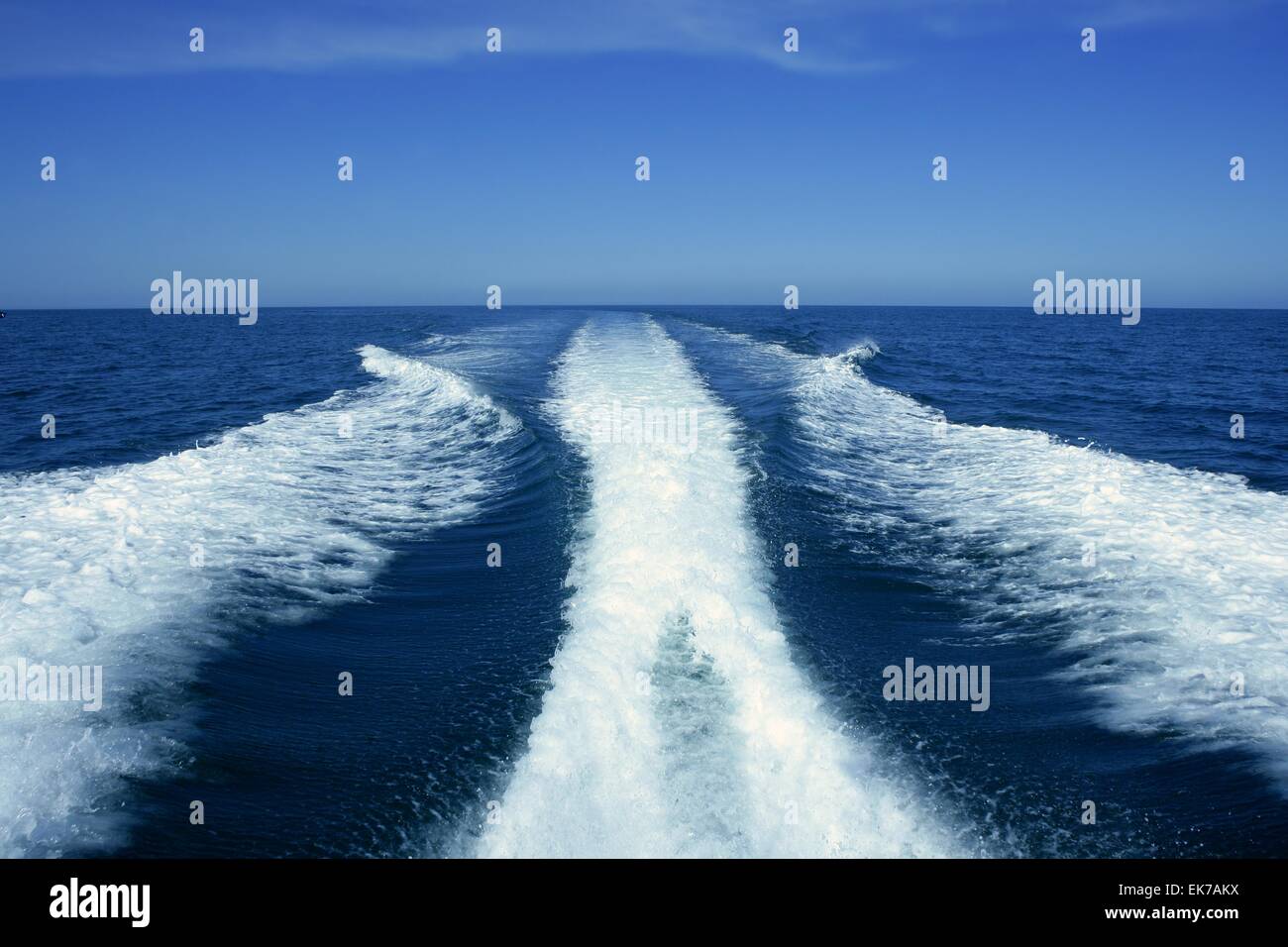 Boat white wake on the blue ocean sea Stock Photo - Alamy