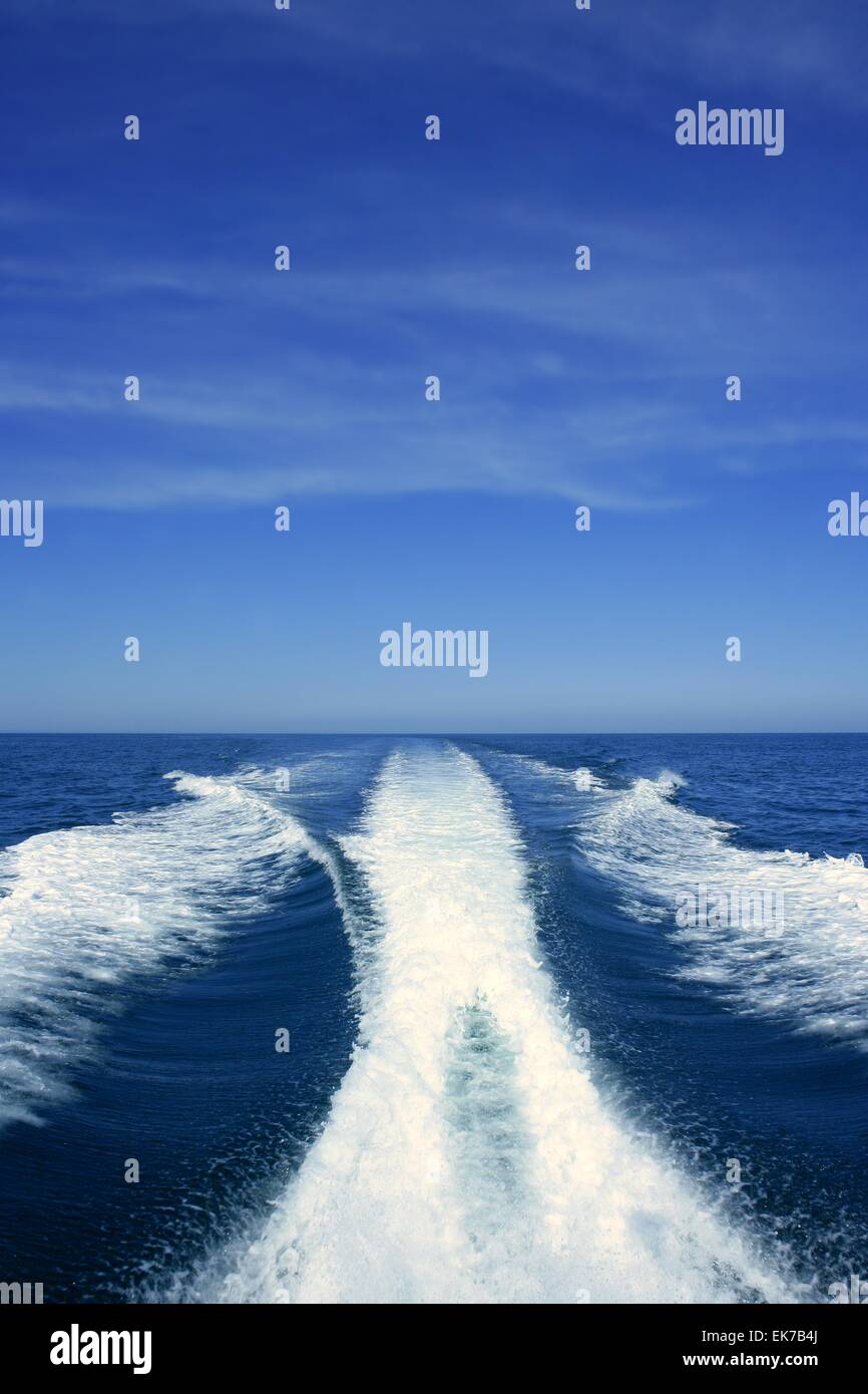 Boat white wake on the blue ocean sea Stock Photo - Alamy