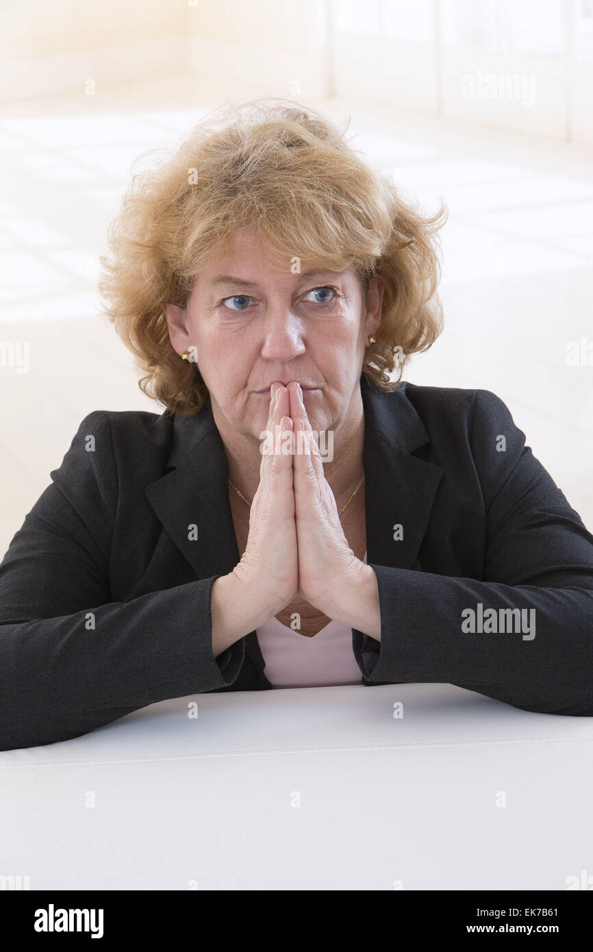 Concern senior woman Stock Photo - Alamy