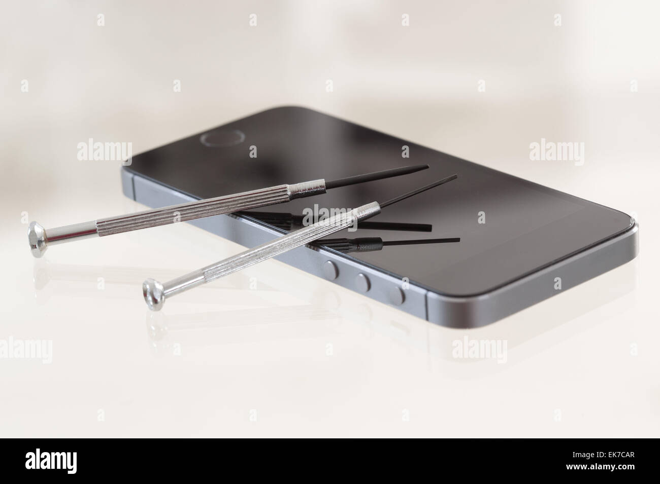 Fixing mobile phone Stock Photo - Alamy Fixing mobile phone Stock Photo - Alamy