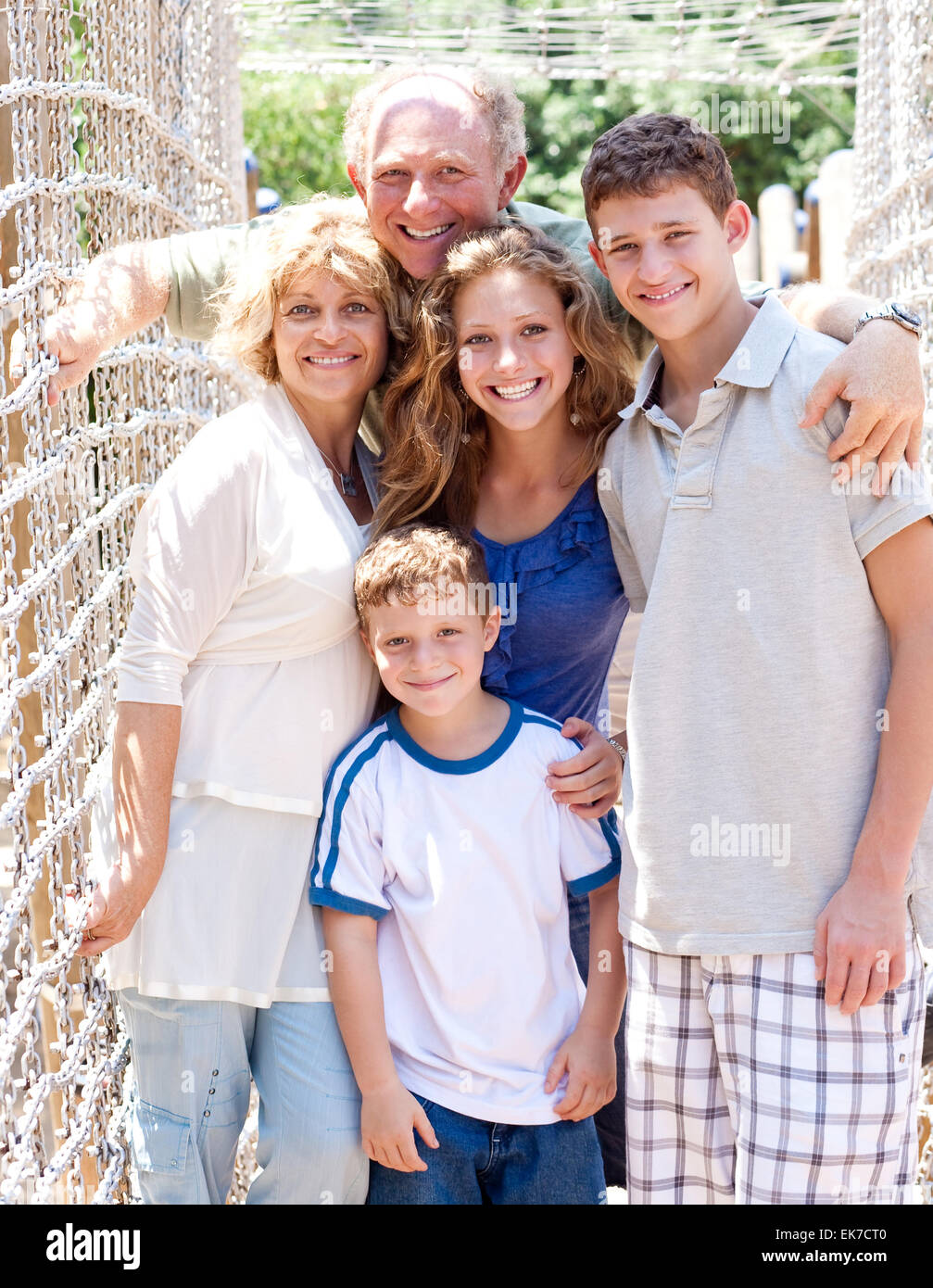 portrait of family on hanging bridge Stock Photo - Alamy