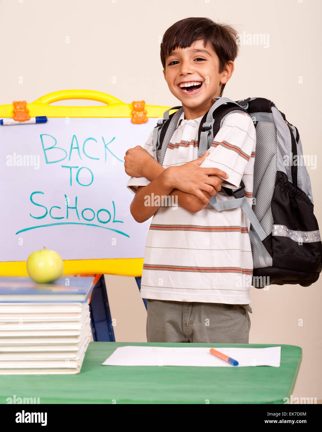 Happy student in his classroom Stock Photo - Alamy