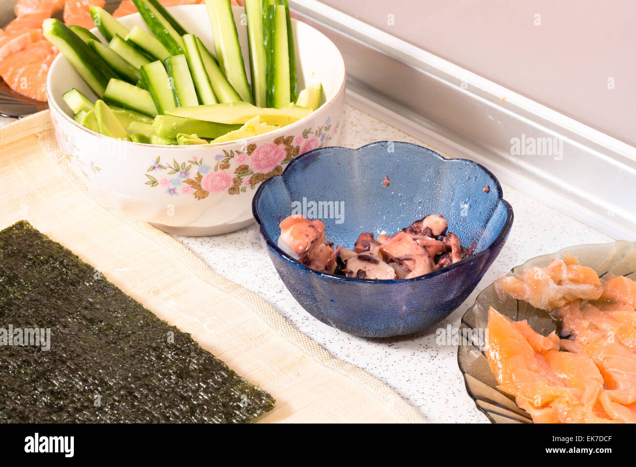 Preparation of homemade sushi in the kitchen Stock Photo - Alamy