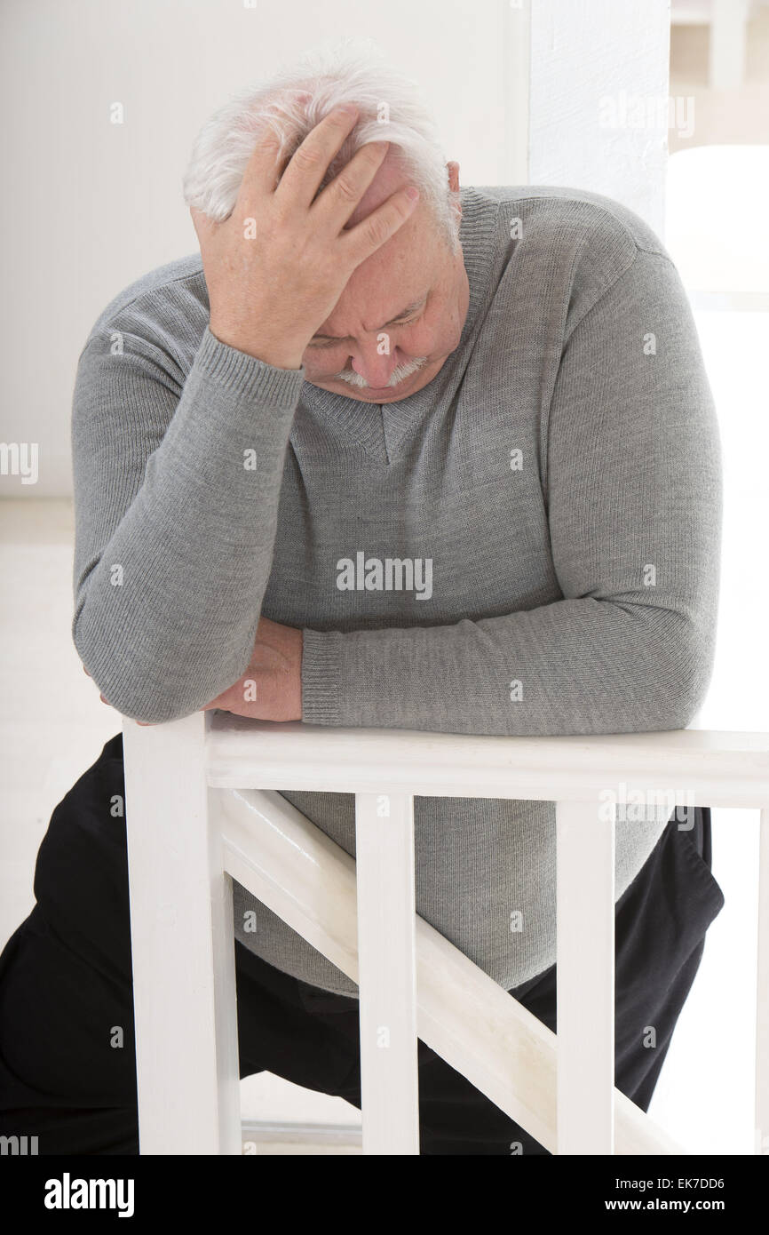 Concern senior man Stock Photo - Alamy