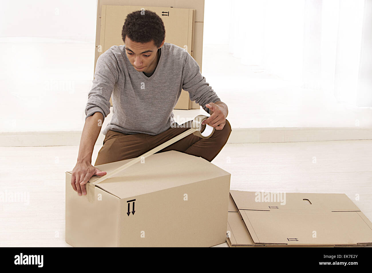 Man fitting interior Stock Photo - Alamy
