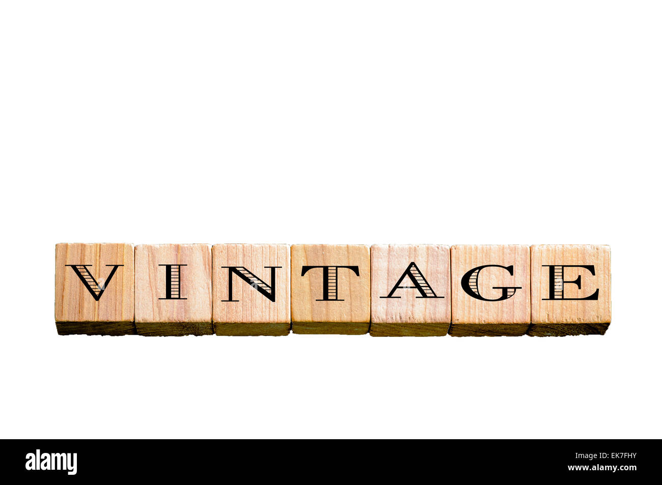 Word VINTAGE. Wooden small cubes with letters isolated on white ...