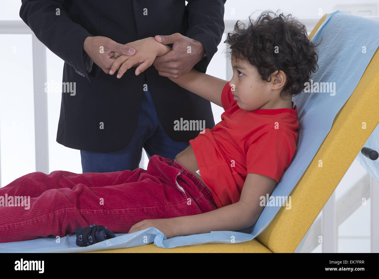 Pain wrist child Stock Photo - Alamy