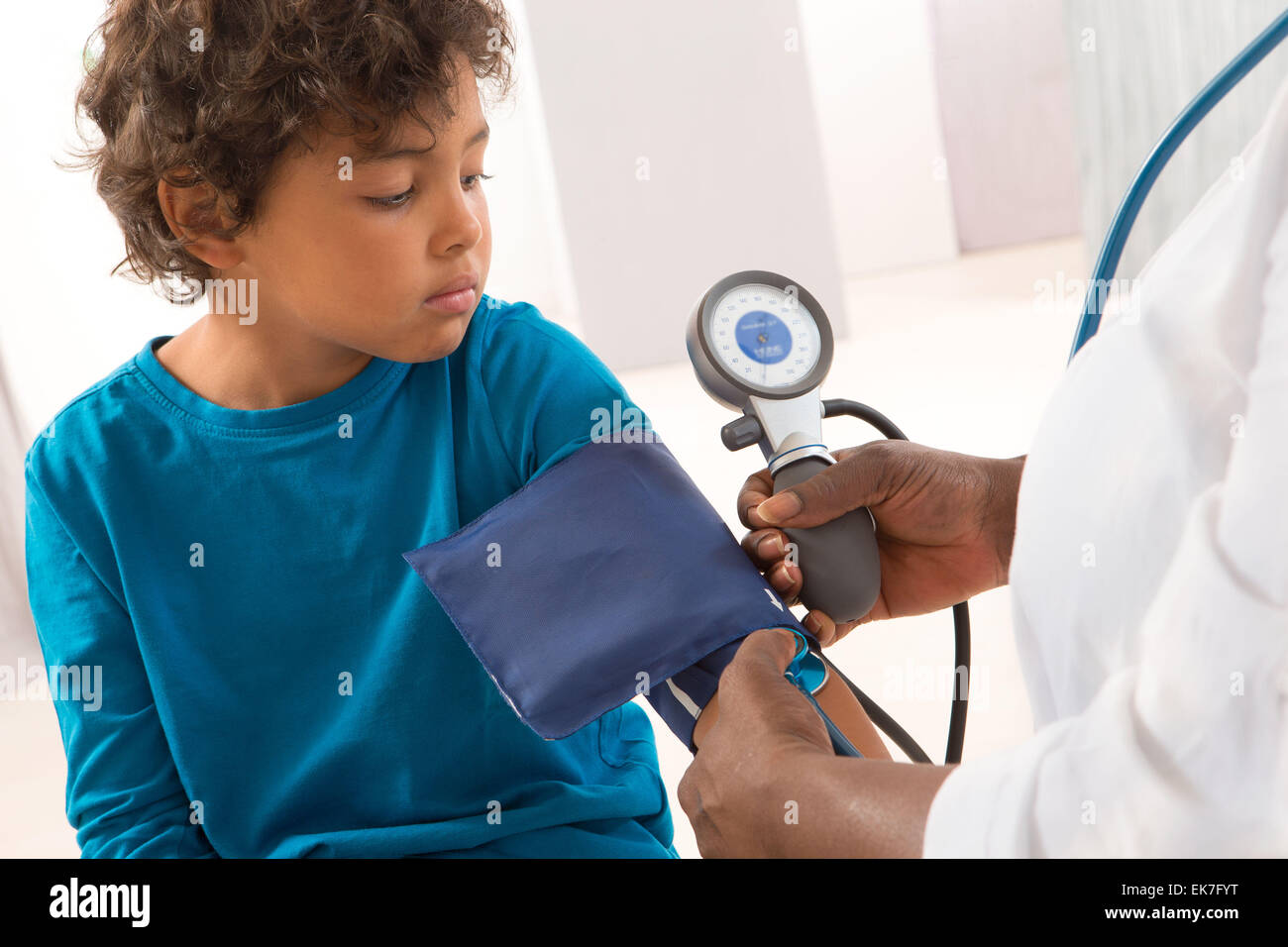 Blood pressure child Stock Photo - Alamy