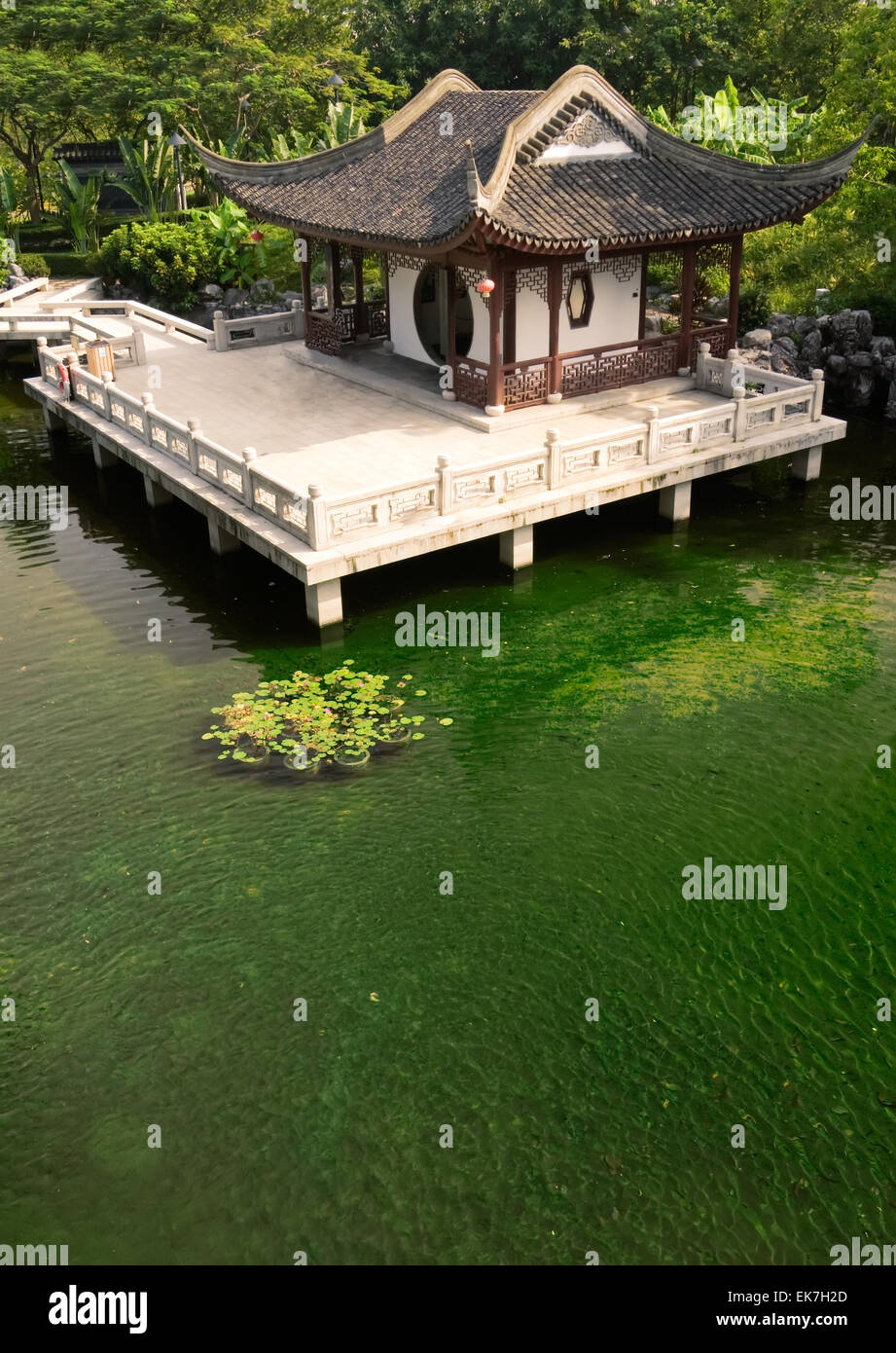 Chinese building near the pond Stock Photo - Alamy