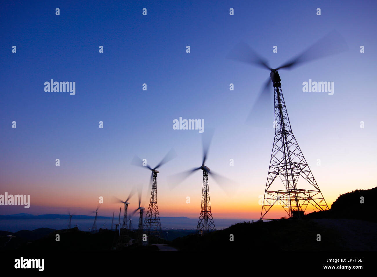 Wind farm in sunset Stock Photo - Alamy