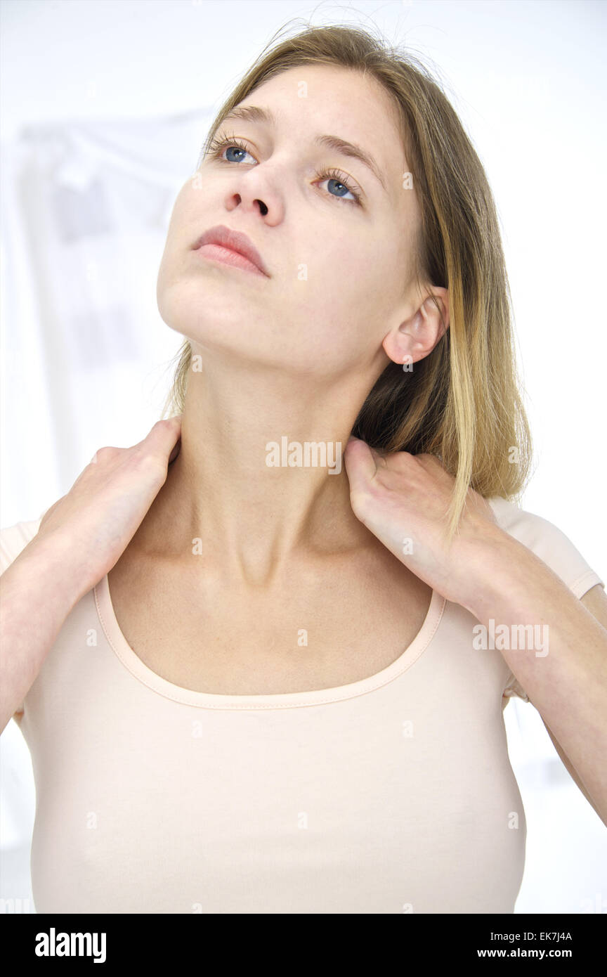 Pain nape of the neck woman Stock Photo - Alamy