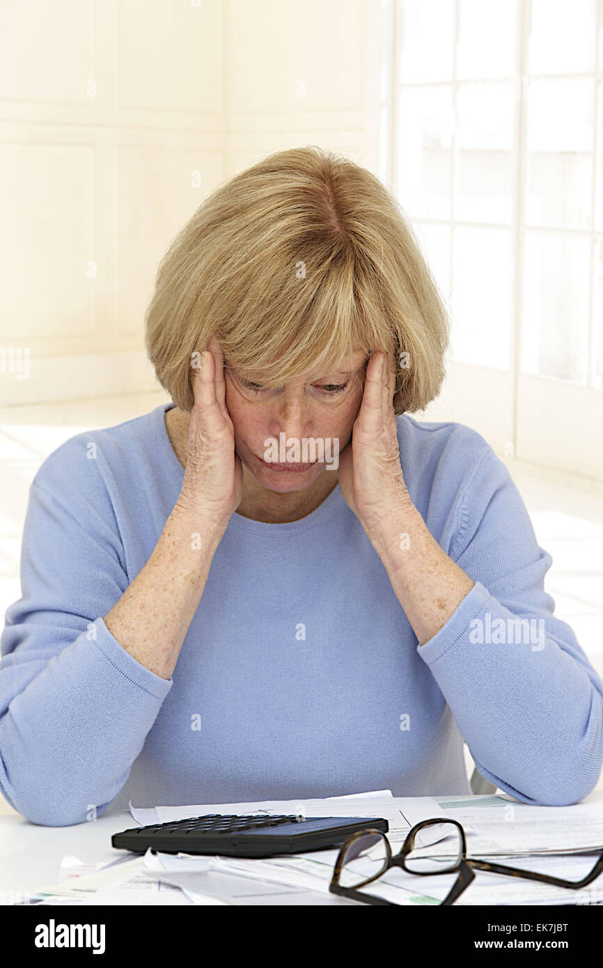 Concern senior woman Stock Photo - Alamy