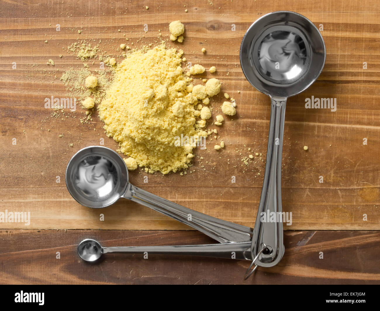 mustard powder with measuring spoons Stock Photo - Alamy