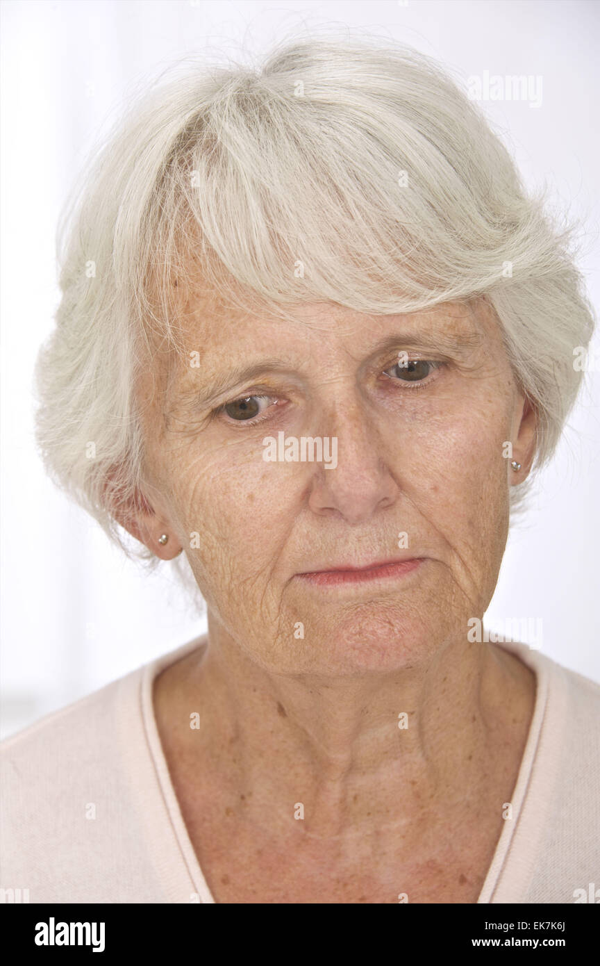 Concern senior woman Stock Photo - Alamy