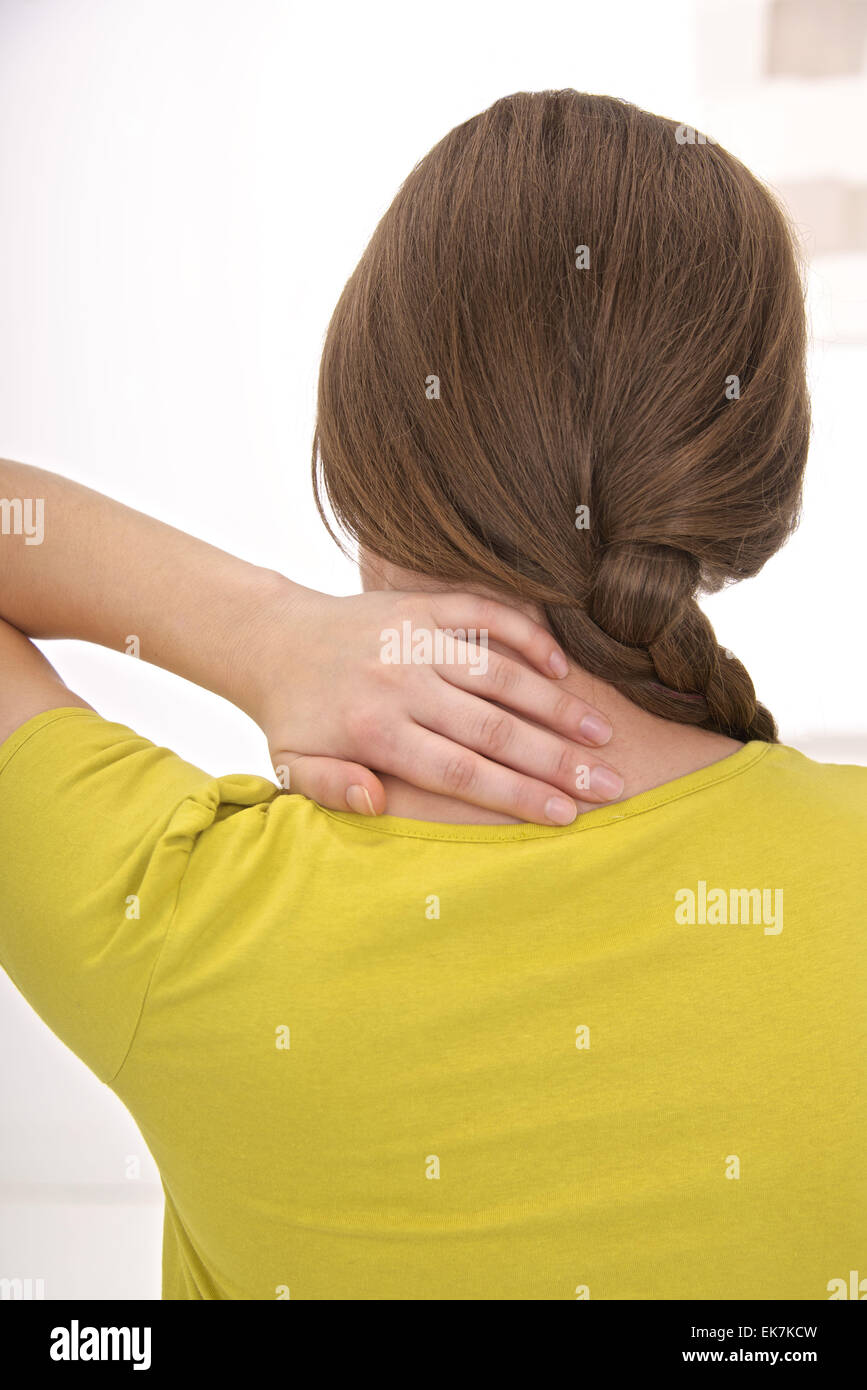 Pain nape of the neck woman Stock Photo - Alamy