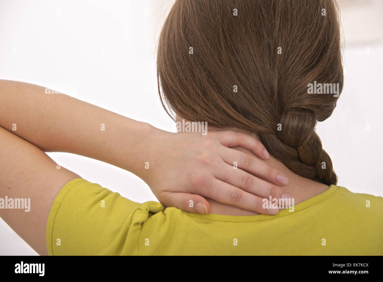 Pain nape of the neck woman Stock Photo - Alamy